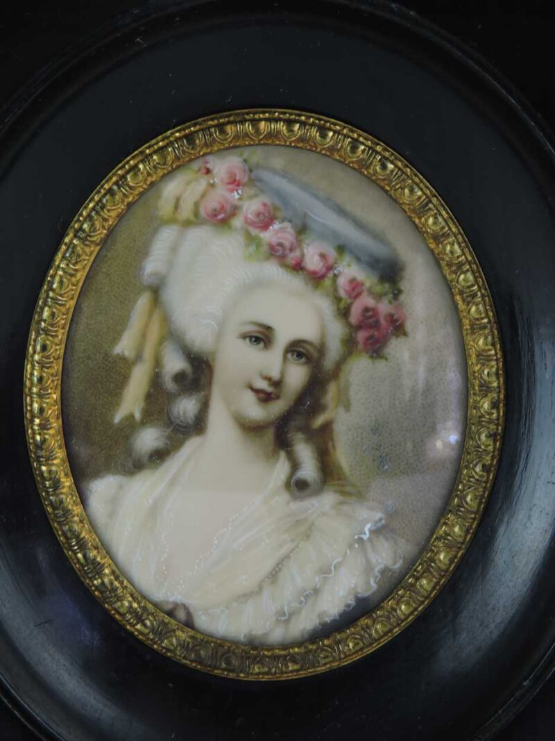 Miniature Portrait Painting of Lady with Hat on Ivory in Ebonized Frame.